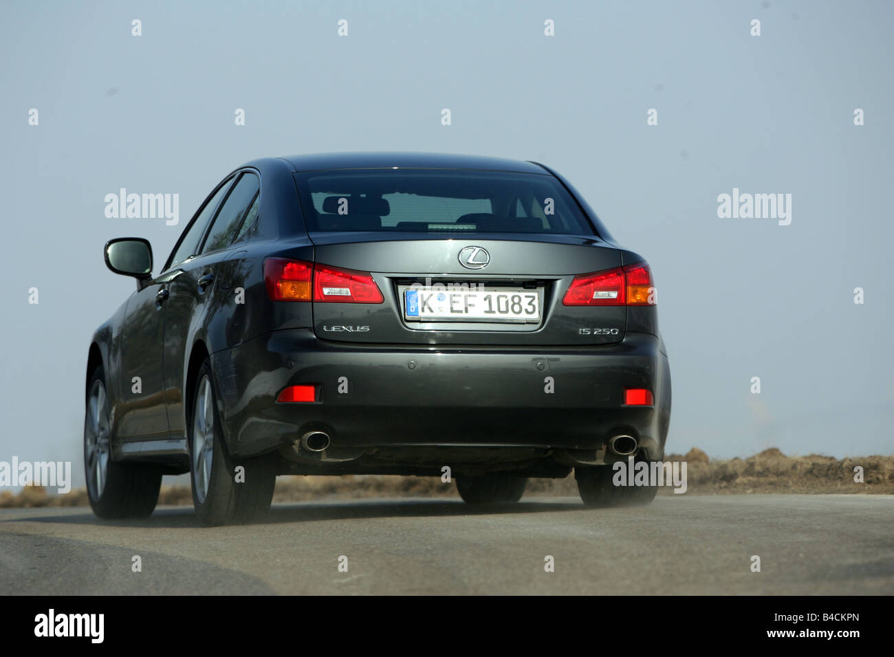Lexus IS 250, model year 2005-, black, driving, diagonal from the back ...