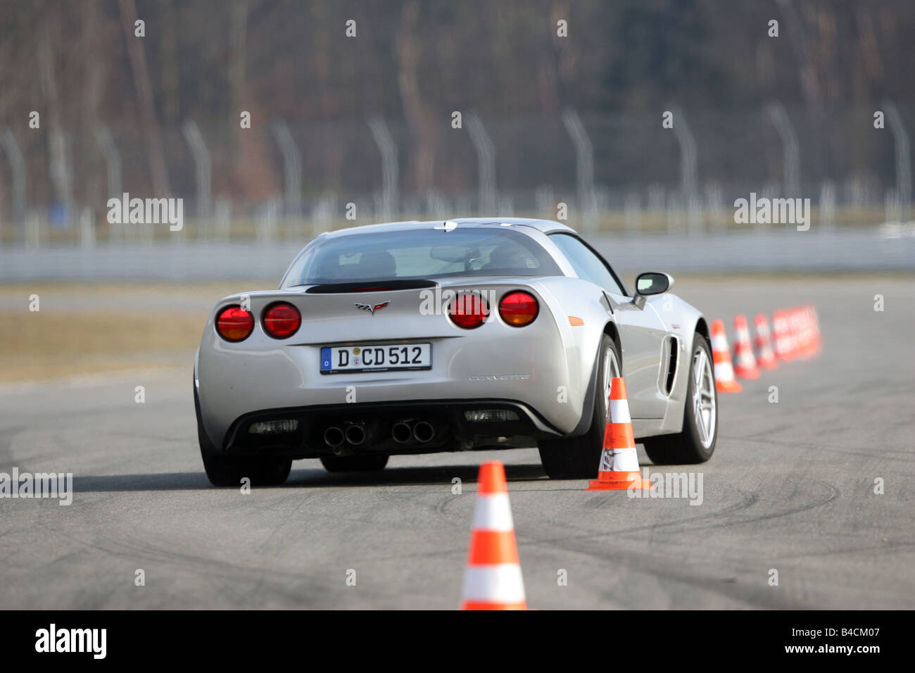 Corvette Z06, model year 2006-, silver, driving, diagonal from the back ...