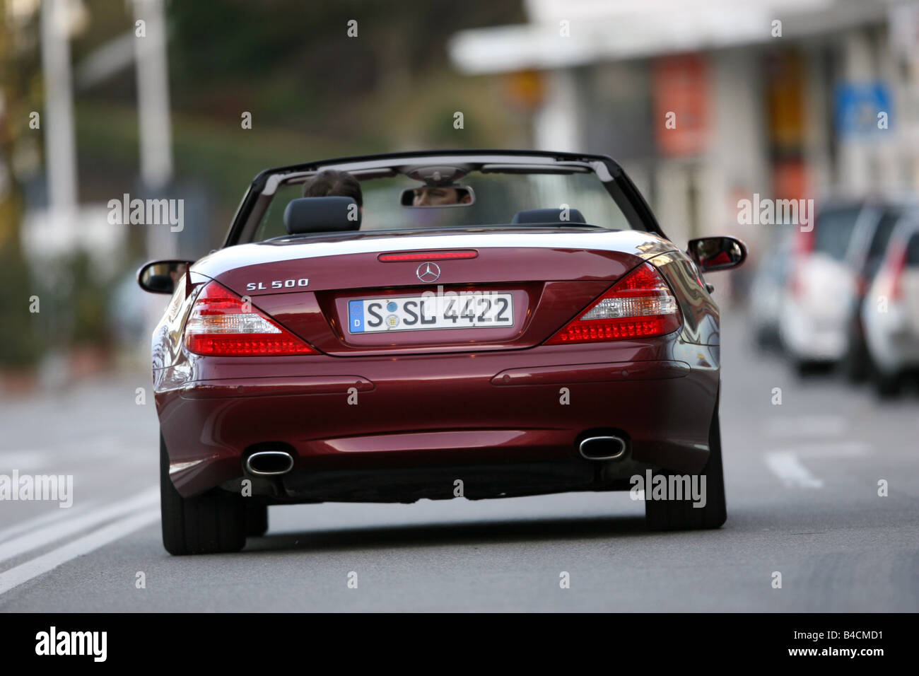 Mercedes SL 500, ruby colored, model year 2006-, driving, diagonal from ...