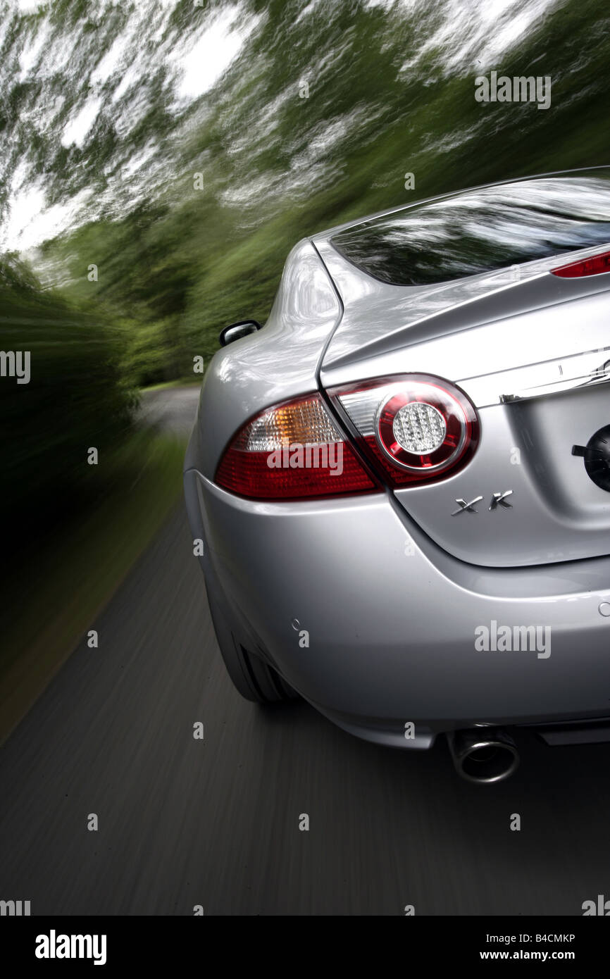 Jaguar XK Coupe, model year 2006-, silver, driving, diagonal from the ...