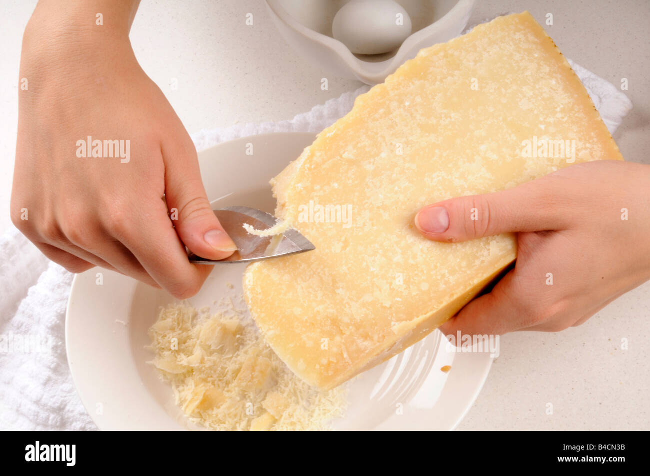 SHAVING PARMESAN CHEESE Stock Photo - Alamy
