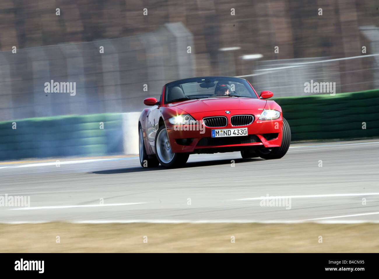 BMW Z4 M Roadster, model year 2006-, red, driving, diagonal from the ...