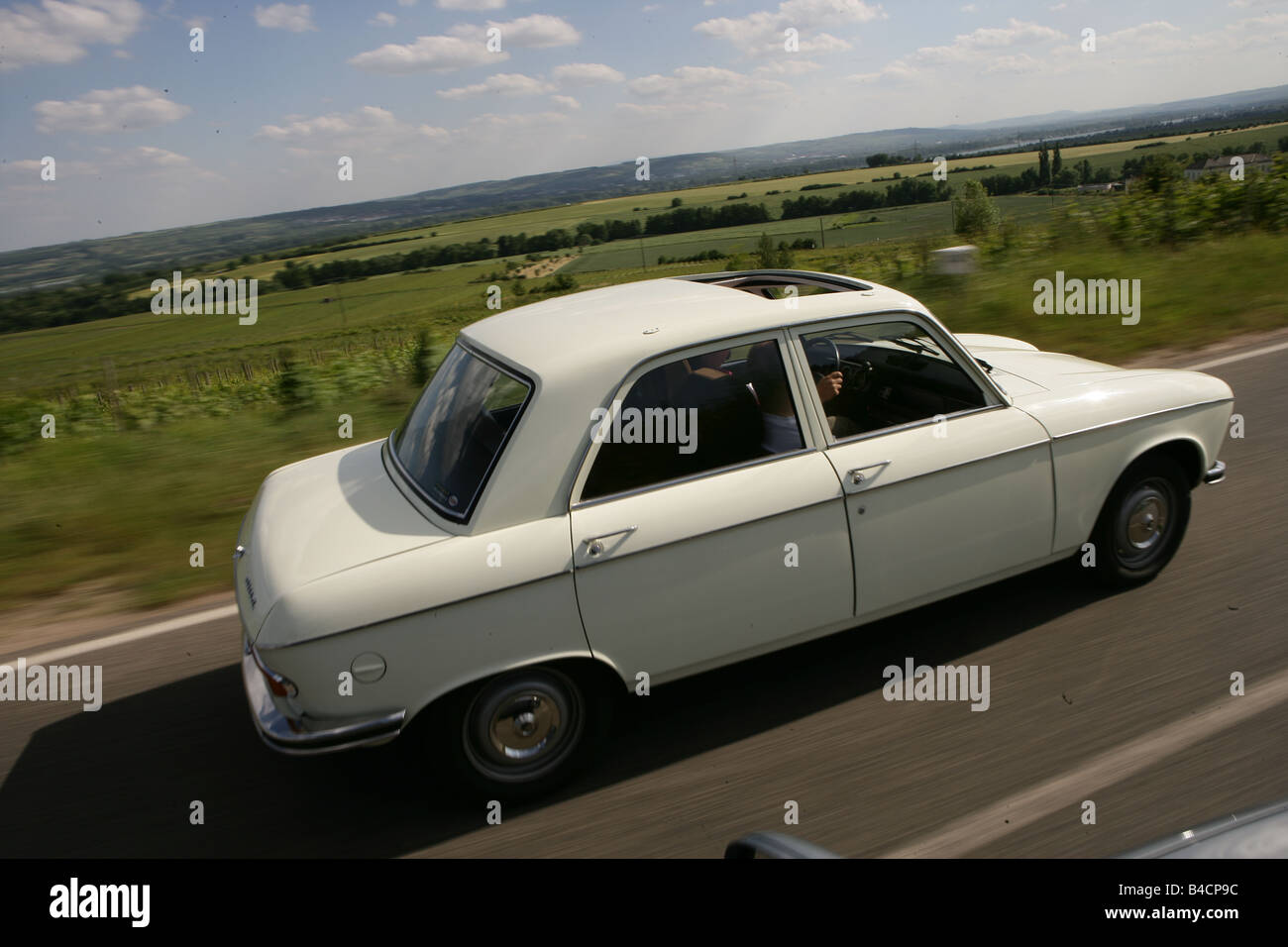 Peugeot 204, Vintage approx., model year 1965, driving, diagonal from ...