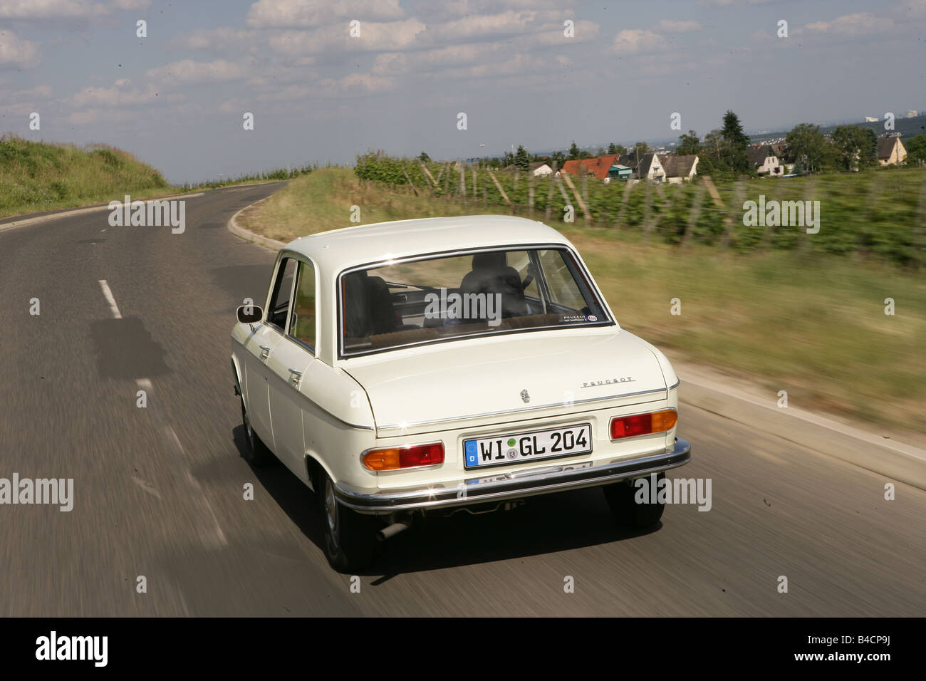 Peugeot 204, Vintage approx., model year 1965, driving, diagonal from ...