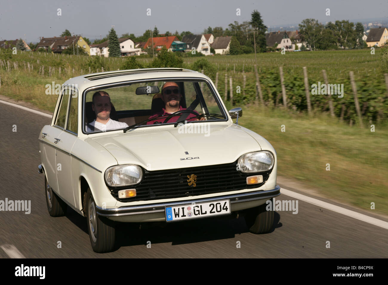 Peugeot 204, Vintage approx., model year 1965, driving, diagonal from ...