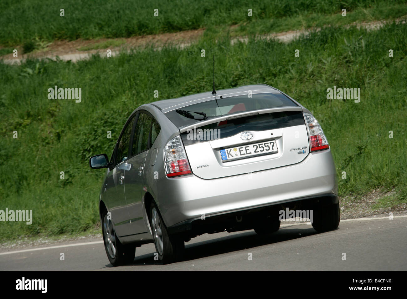 Toyota Prius, model year 2006-, silver, driving, diagonal from the back ...