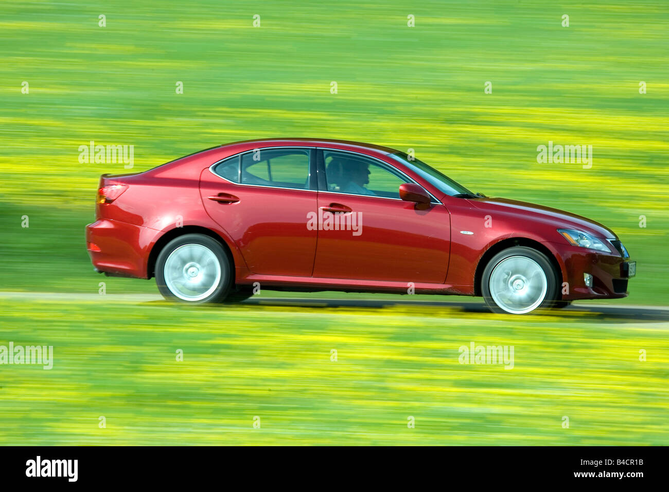 Lexus IS 220d, model year 2006-, red, driving, side view, country road ...