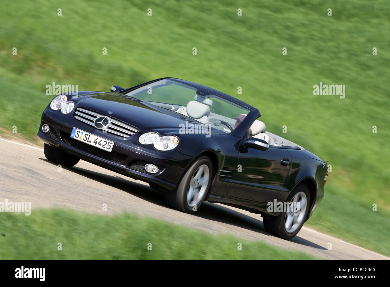 Mercedes SL 500, model year 2006-, black, open top, driving, diagonal ...