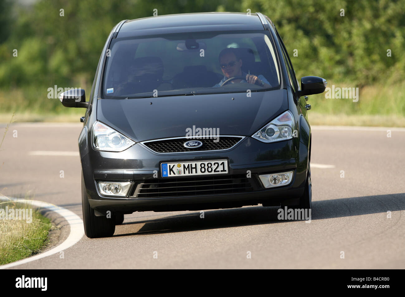 Ford Galaxy 2.0 TDCi, model year 2006-, black, driving, diagonal from ...