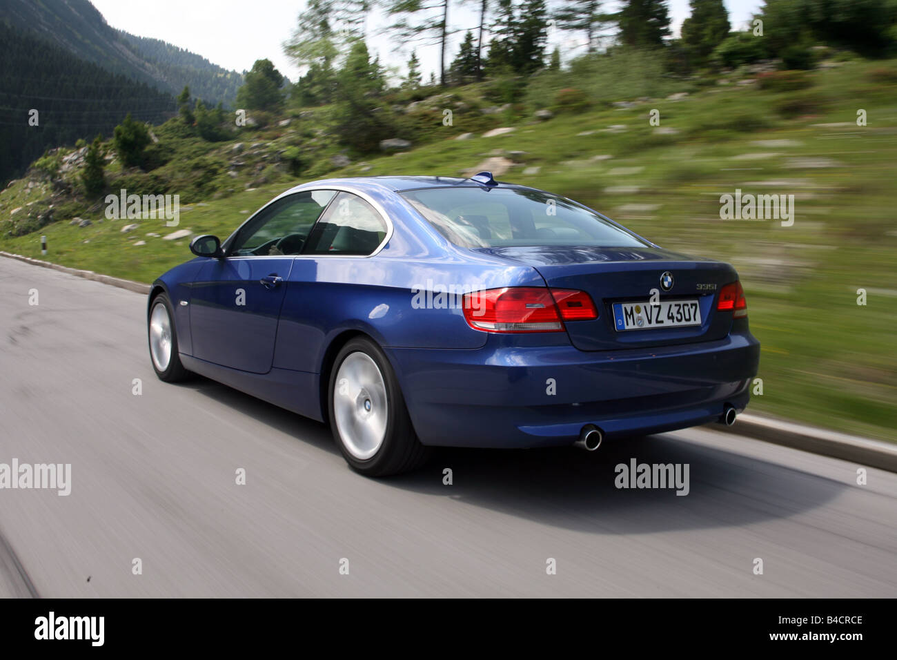 BMW 335i Coupe, coupe, model year 2006-, blue moving, diagonal from the ...