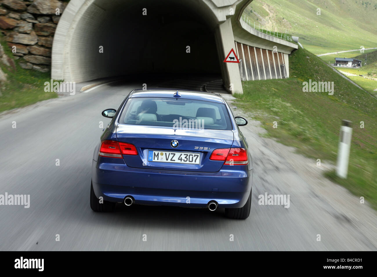 BMW 335i Coupe, coupe, model year 2006-, blue moving, diagonal from the ...