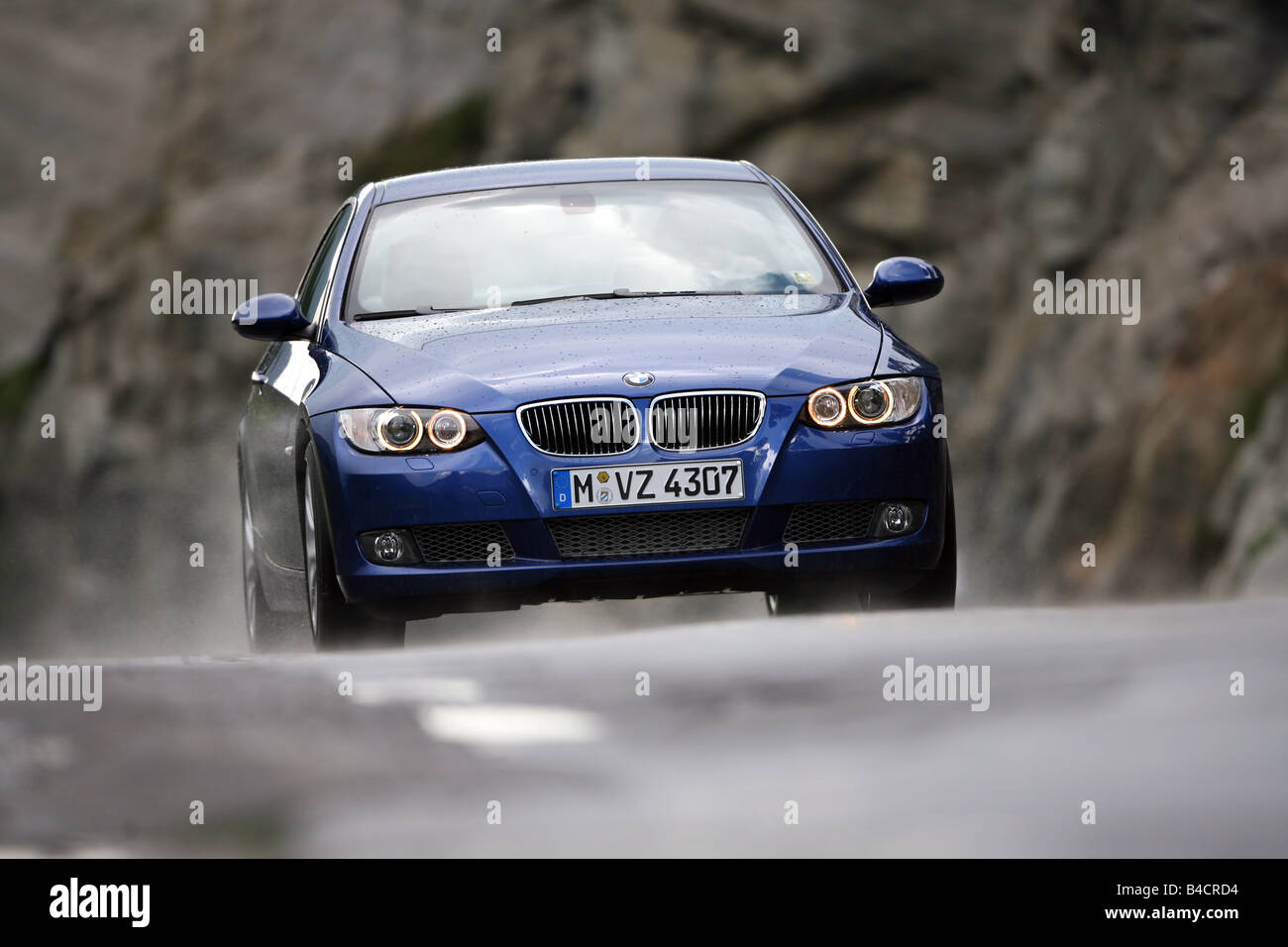 BMW 335i Coupe, coupe, model year 2006-, blue moving, diagonal from the ...