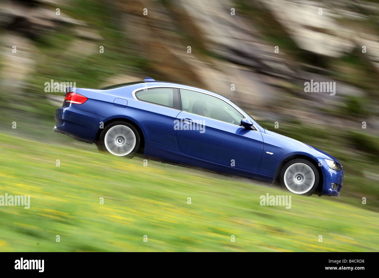 BMW 335i Coupe, coupe, model year 2006-, blue moving, side view ...