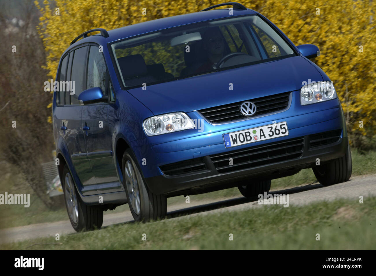 Car, VW Volkswagen Touran TDI, Van, model year 2003-, blue moving ...