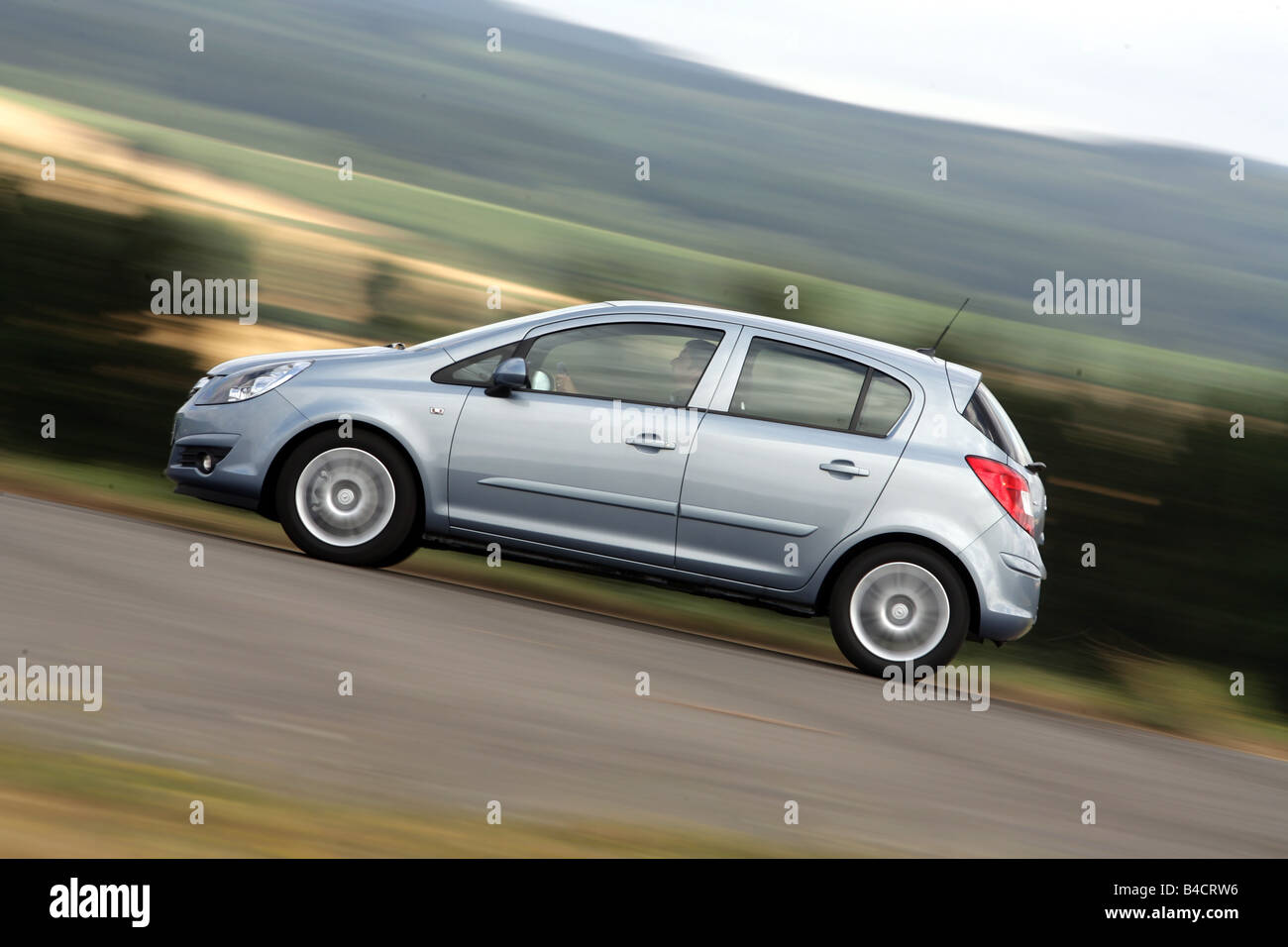 Opel Corsa CDTi, model year 2006-, silver, driving, side view, country ...