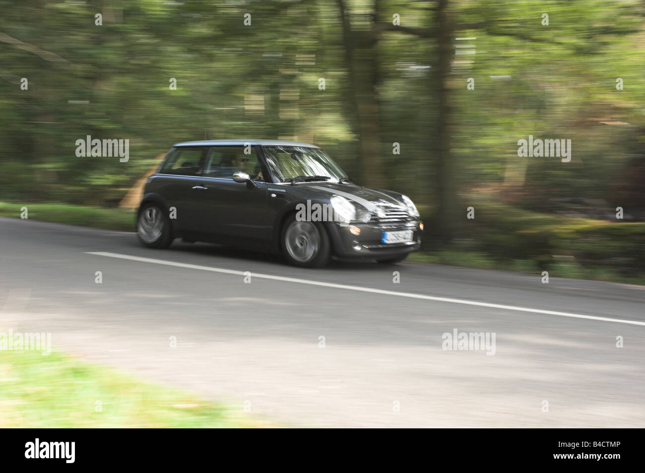 Driving a mini hi-res stock photography and images - Alamy