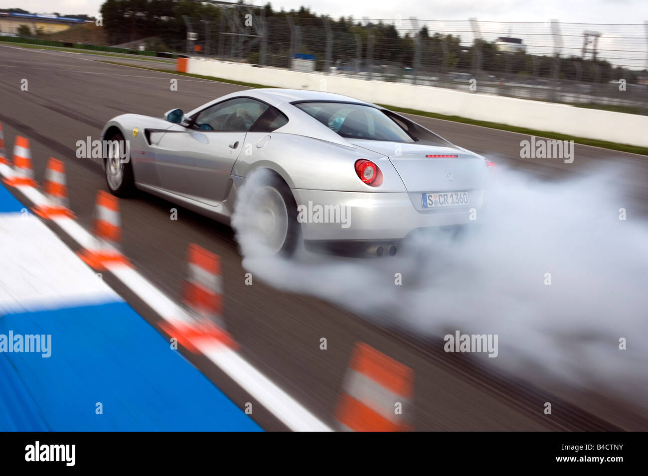 Ferrari 599 GTB Fiorano F1, model year 2006-, silver, driving, diagonal ...