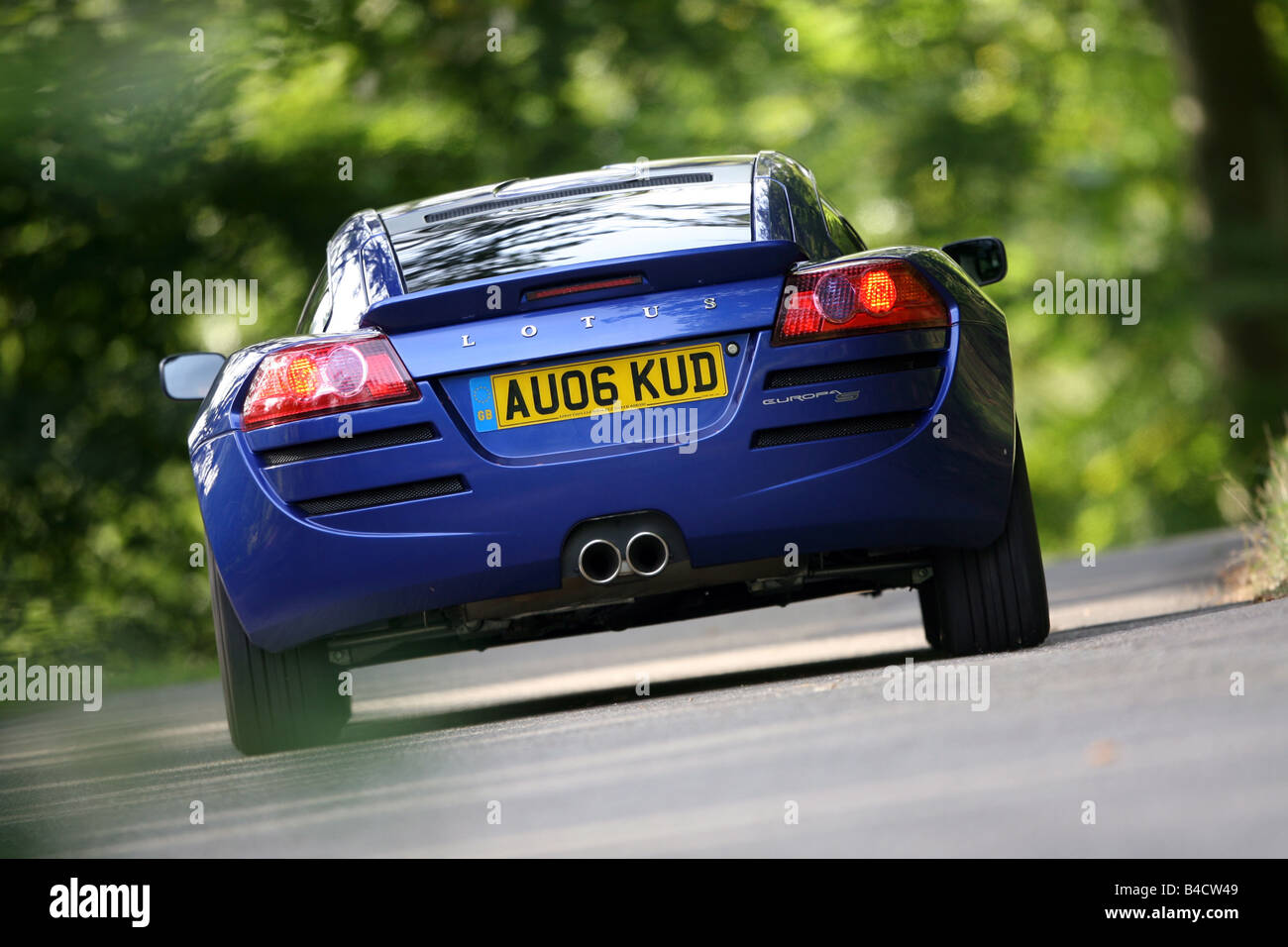 Lotus Europa S, model year 2006-, blue moving, diagonal from the back ...