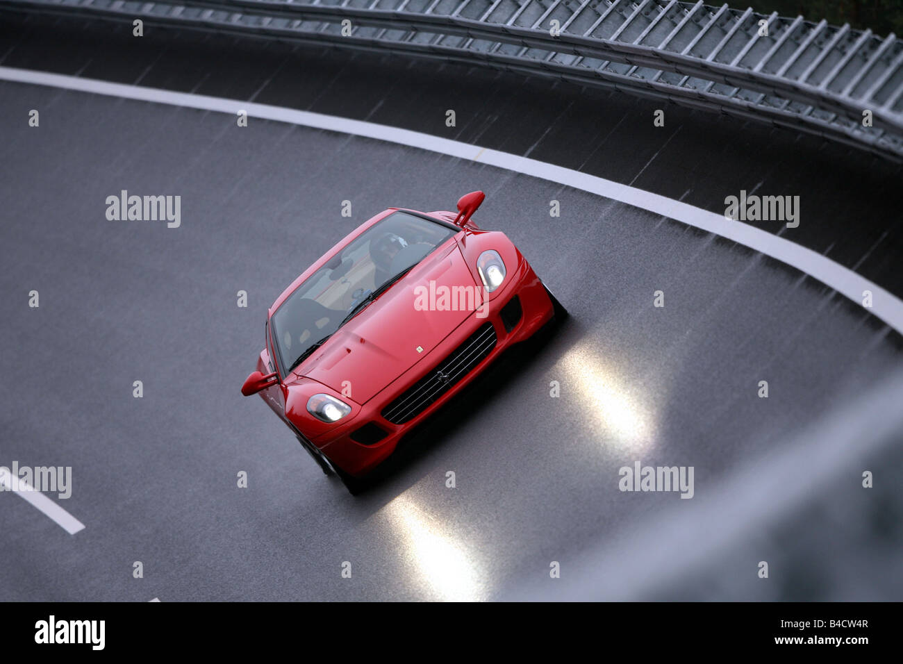 Ferrari 599 GTB Fiorano, model year 2006-, red, driving, diagonal from ...