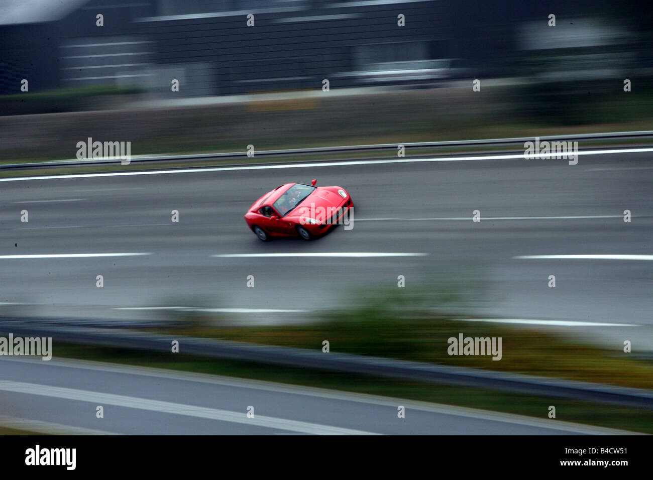 Ferrari 599 GTB Fiorano, model year 2006-, red, driving, diagonal from ...