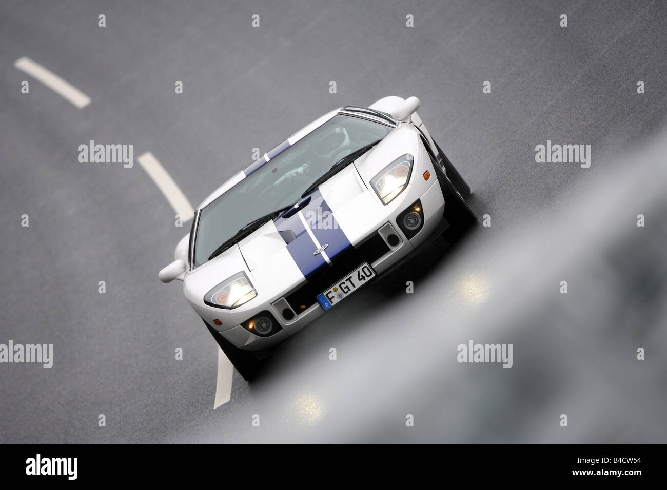 Ford GT, model year 2005-, white-blue moving, diagonal from the front ...