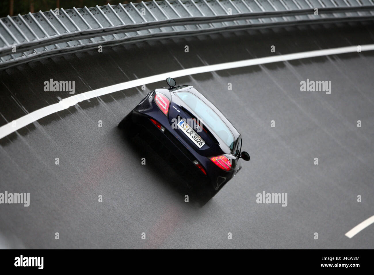 Mercedes SLR McLaren, model year 2004-, blue moving, diagonal from the ...