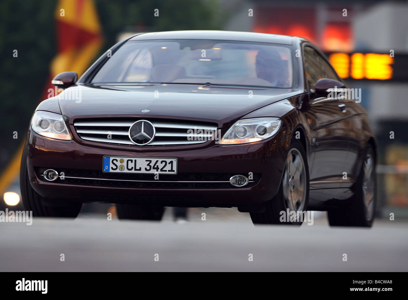 Mercedes CL 600, model year 2006-, ruby colored, driving, diagonal from ...