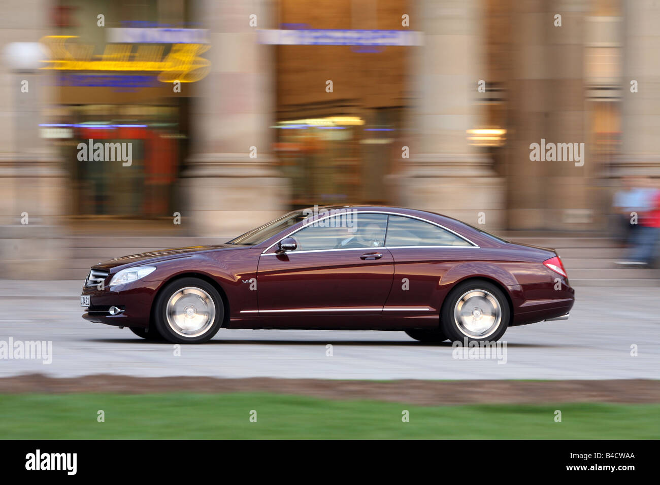 Mercedes CL 600, model year 2006-, ruby colored, driving, side view ...