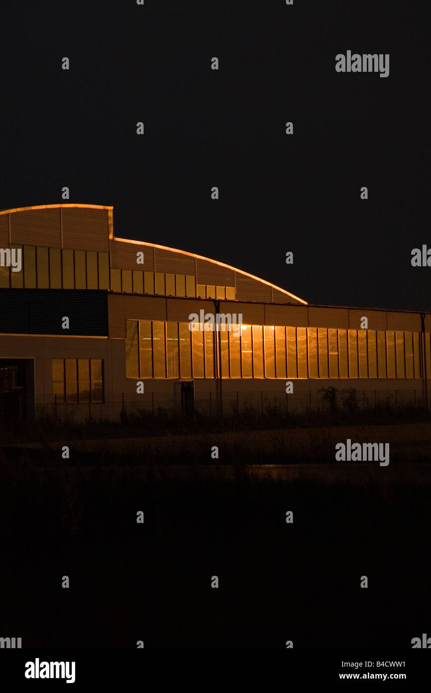 Factory on the outskirts of Kosching with the sunset reflecting in its ...