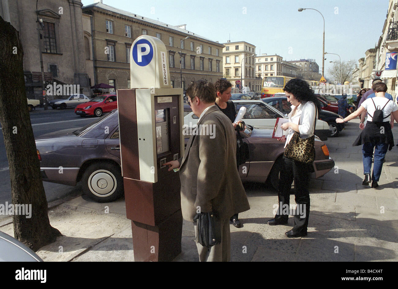 People at a parking meter in Warsaw, Poland Stock Photo - Alamy