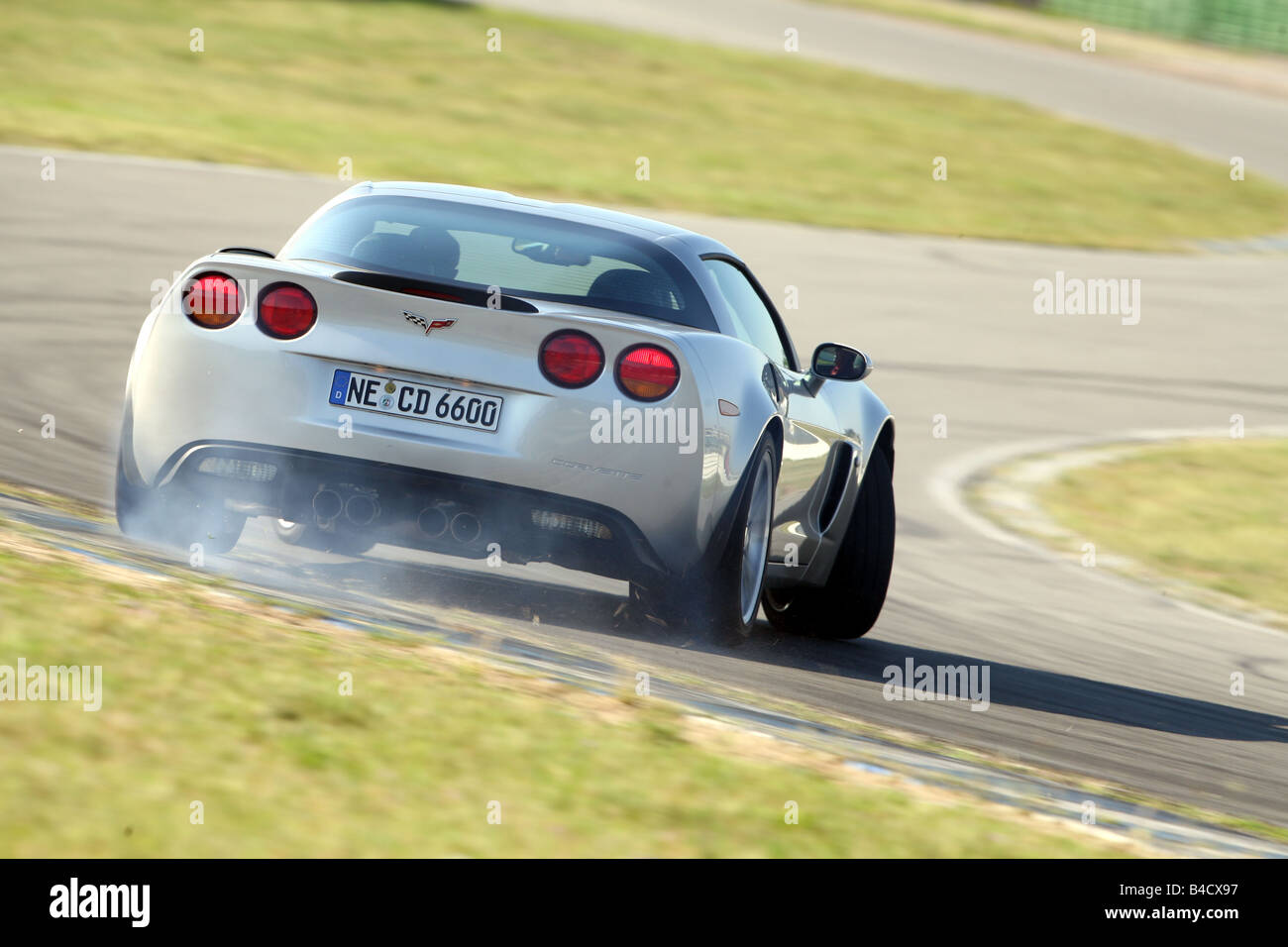 Corvette Z06, model year 2006-, silver, driving, diagonal from the back ...