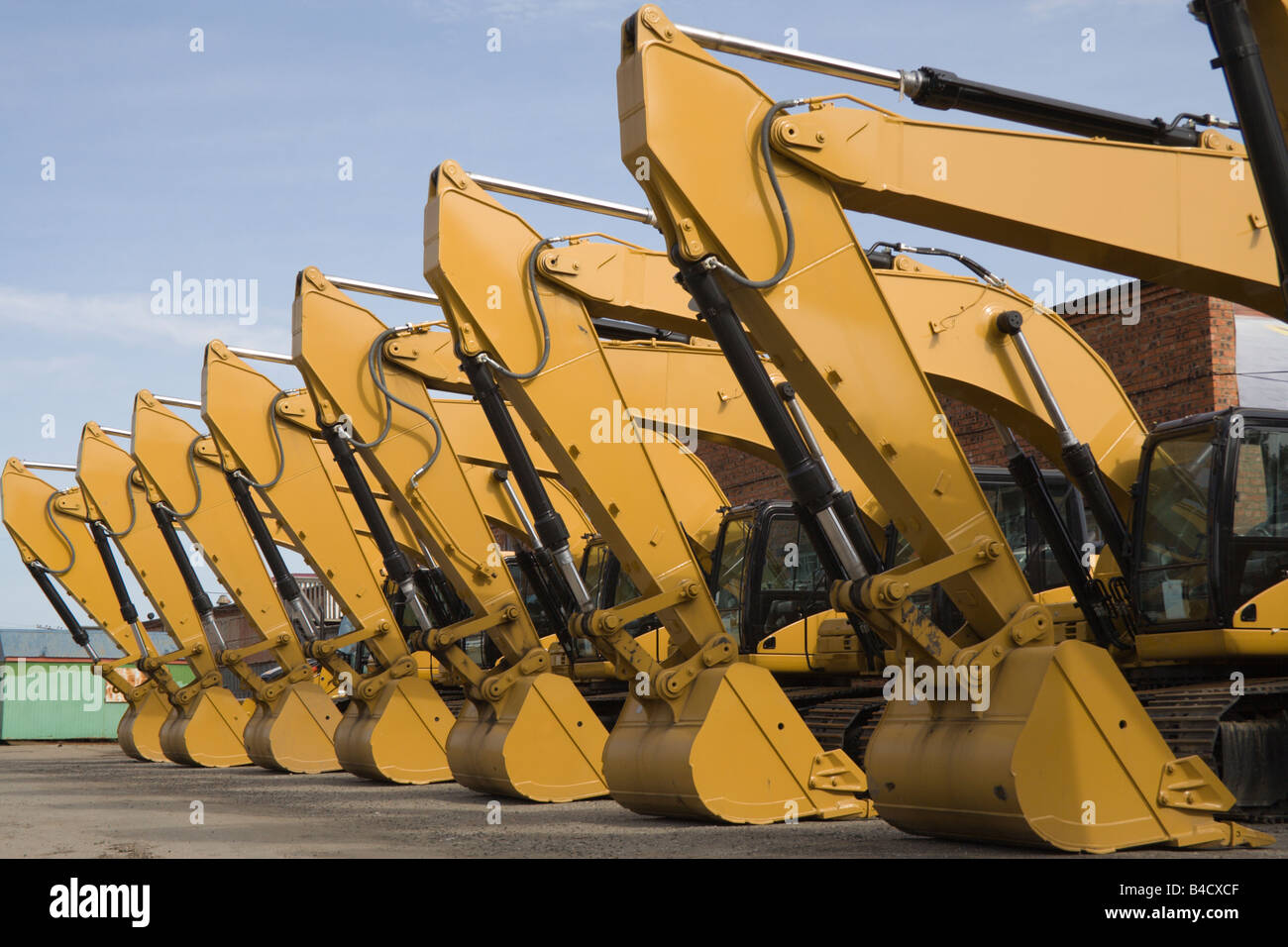 row of excavators Stock Photo - Alamy