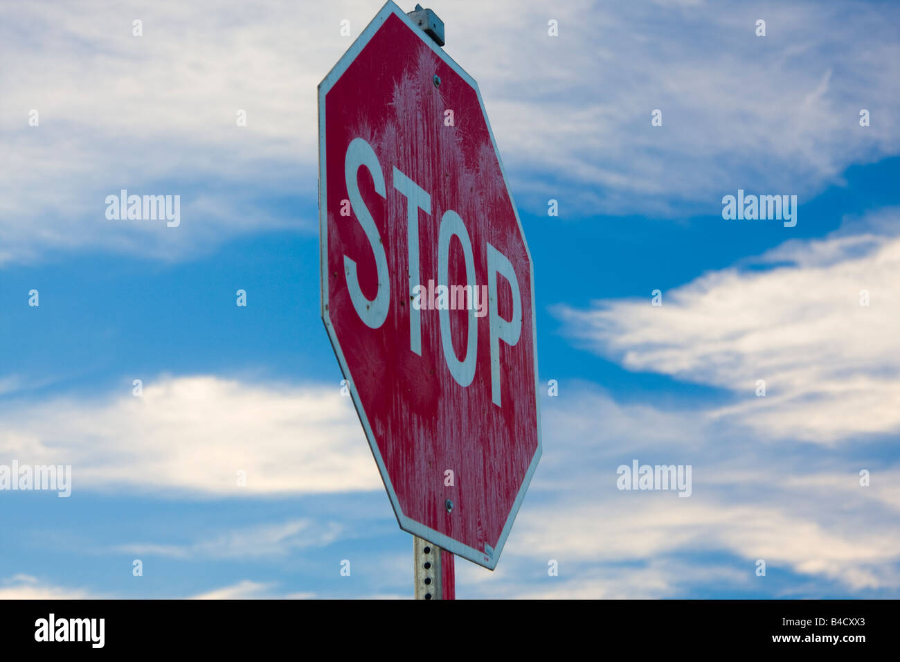 Bright Red Stop sign on cloudy day Stock Photo - Alamy