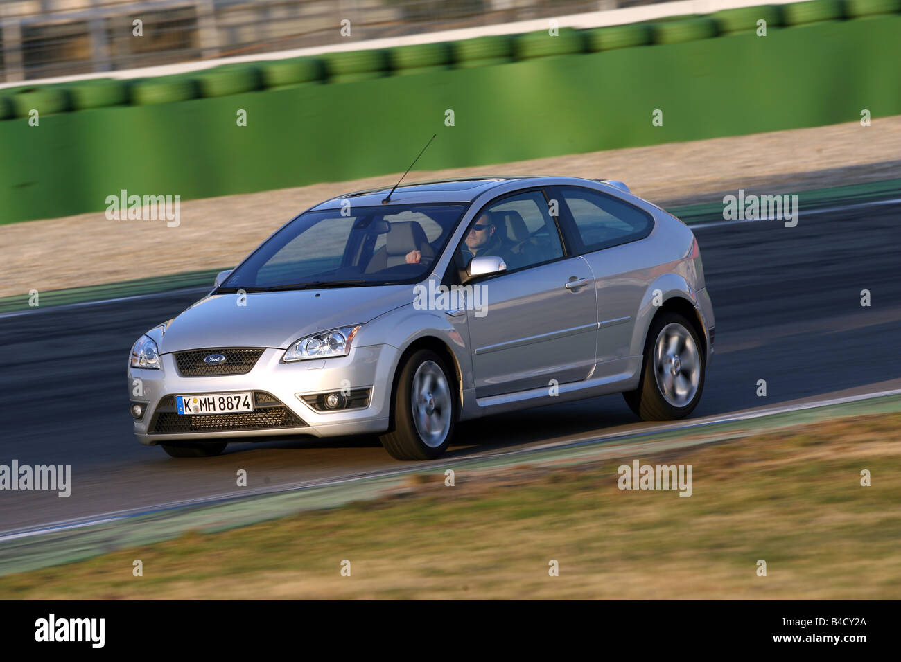 Ford Focus ST, model year 2005-, silver, driving, diagonal from the ...