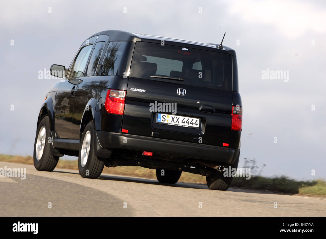 Honda Element, model year 2007-, black, driving, diagonal from the back ...