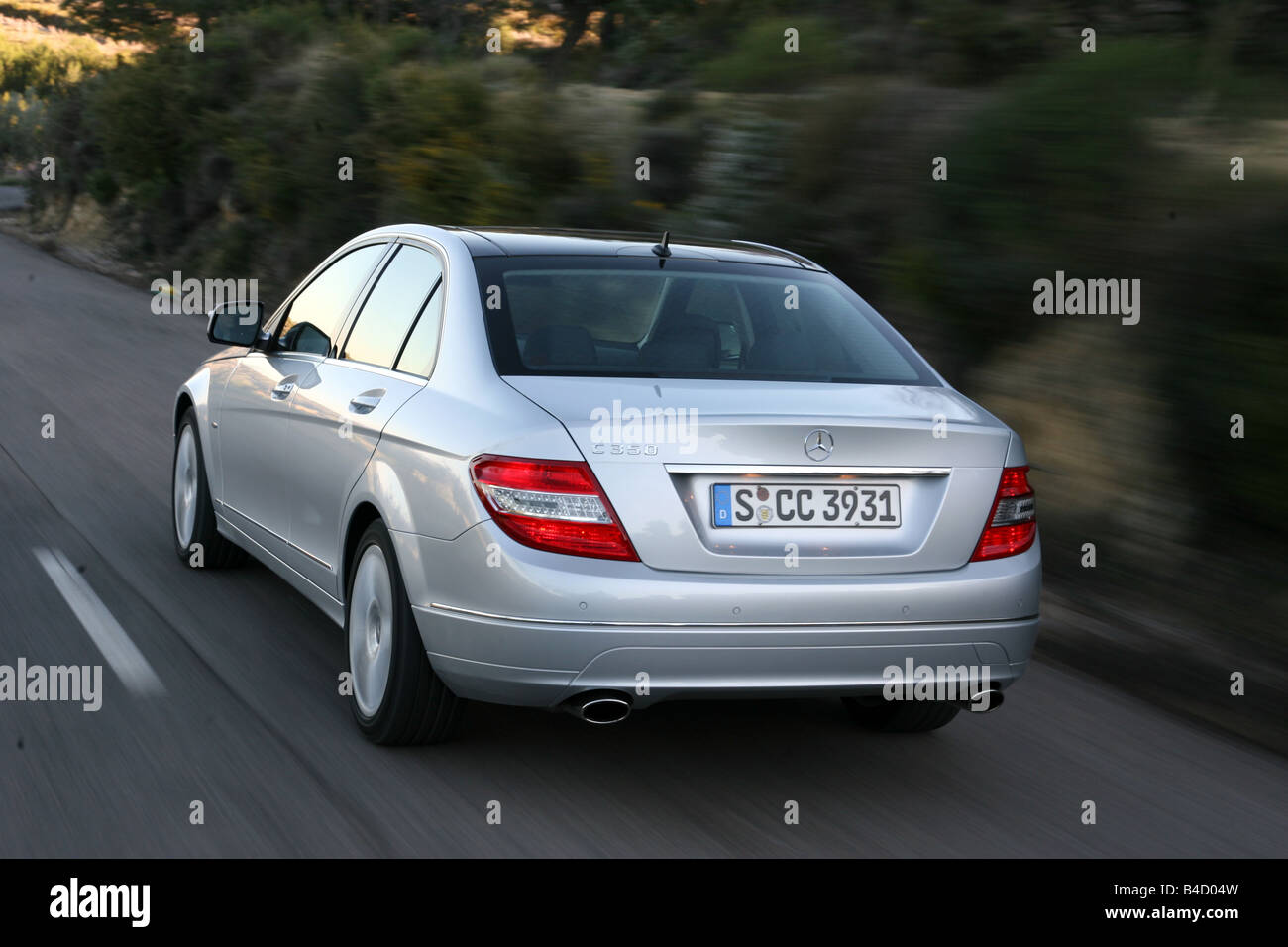 Mercedes C class, model year 2007, silver, driving, diagonal from the ...