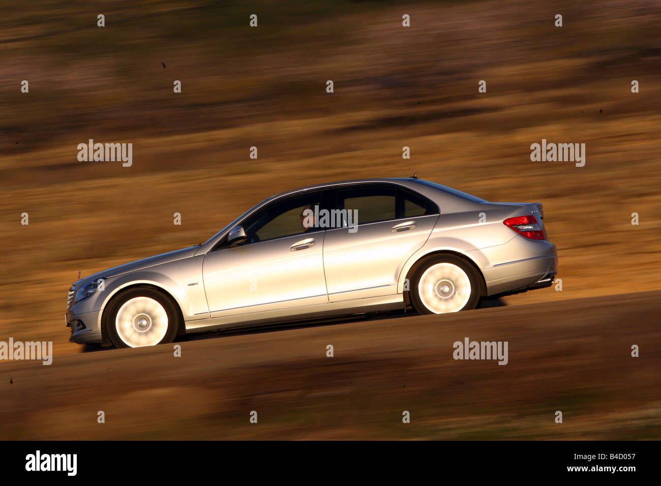 Mercedes C class, model year 2007, silver, driving, side view, country ...