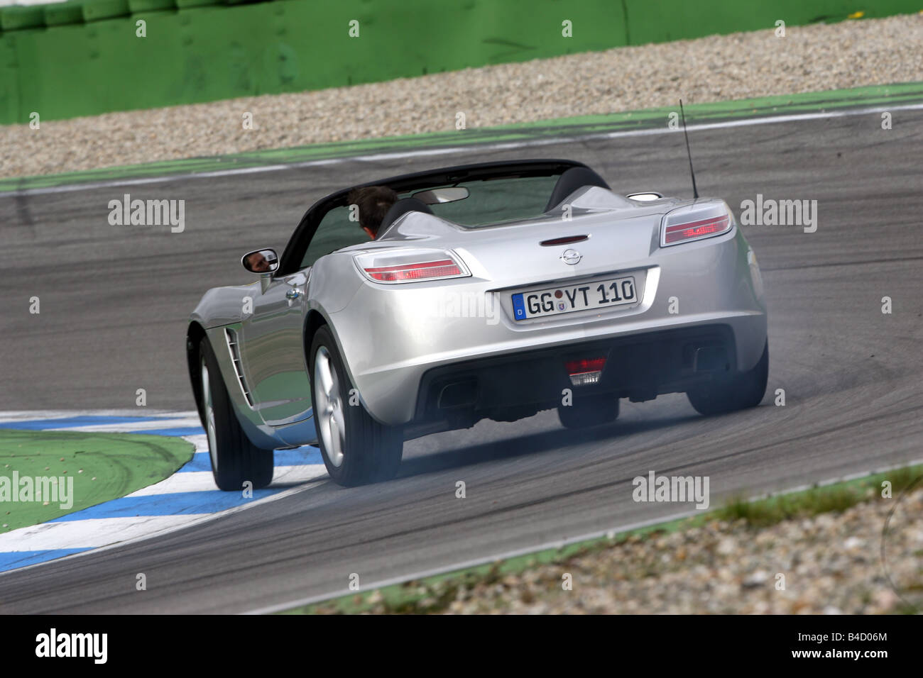 Opel GT, model year 2007-, silver, driving, diagonal from the back ...