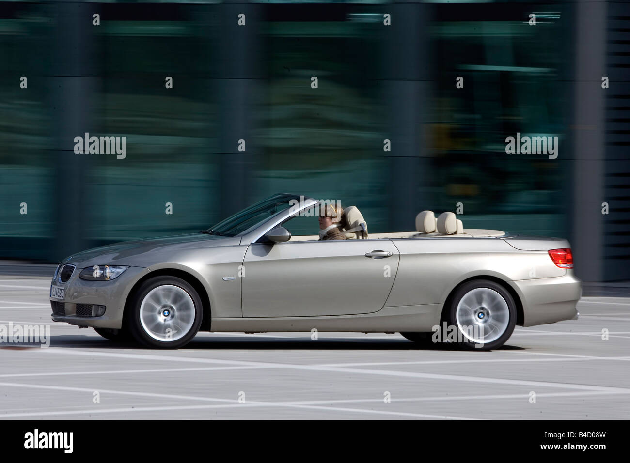 BMW 335i Convertible, model year 2007-, silver, driving, side view ...