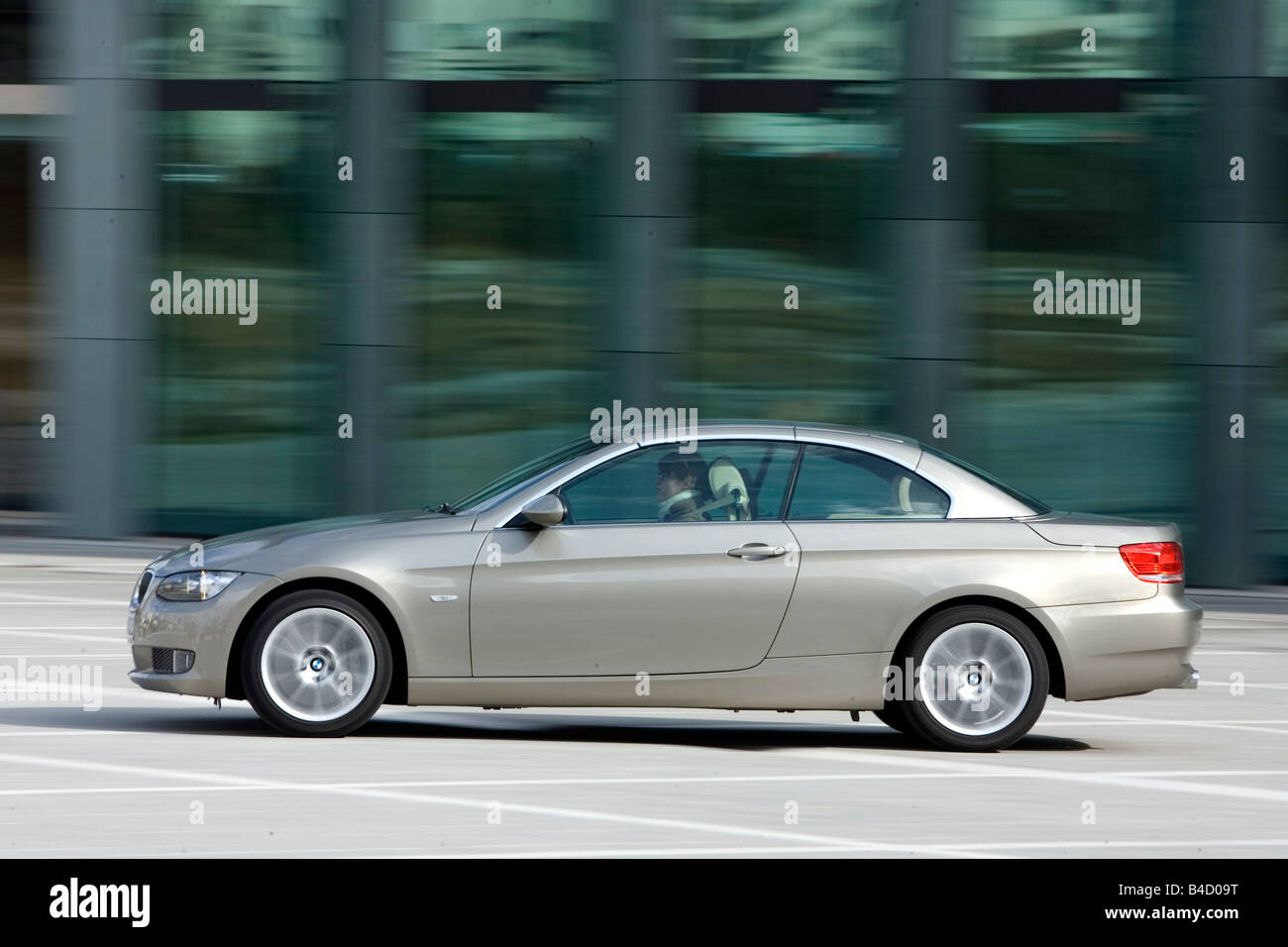 BMW 335i Convertible, model year 2007-, silver, driving, side view ...