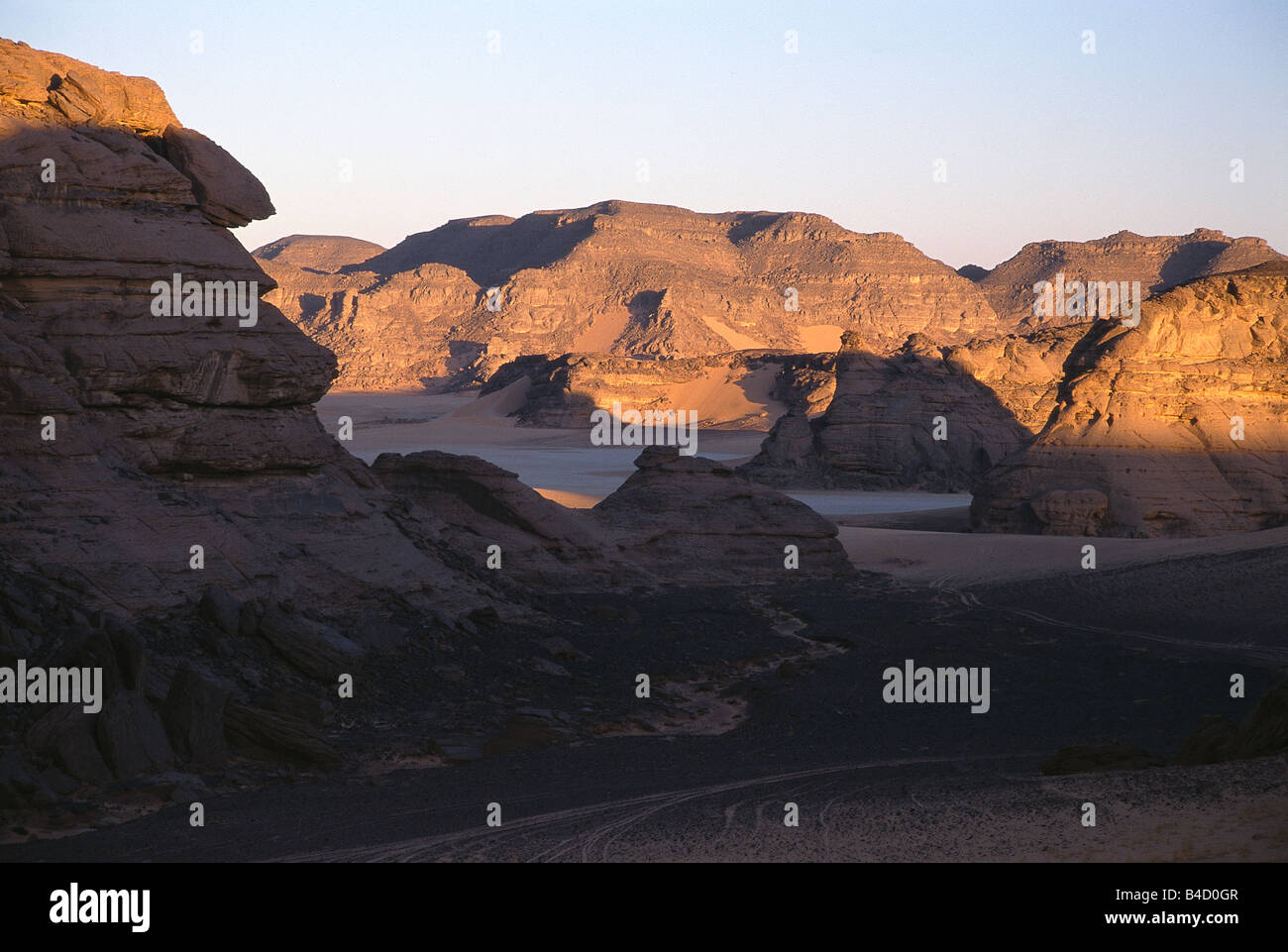 Empty valleys and rocky mountains at Jebel Acacus, Sahara Desert, Libya ...