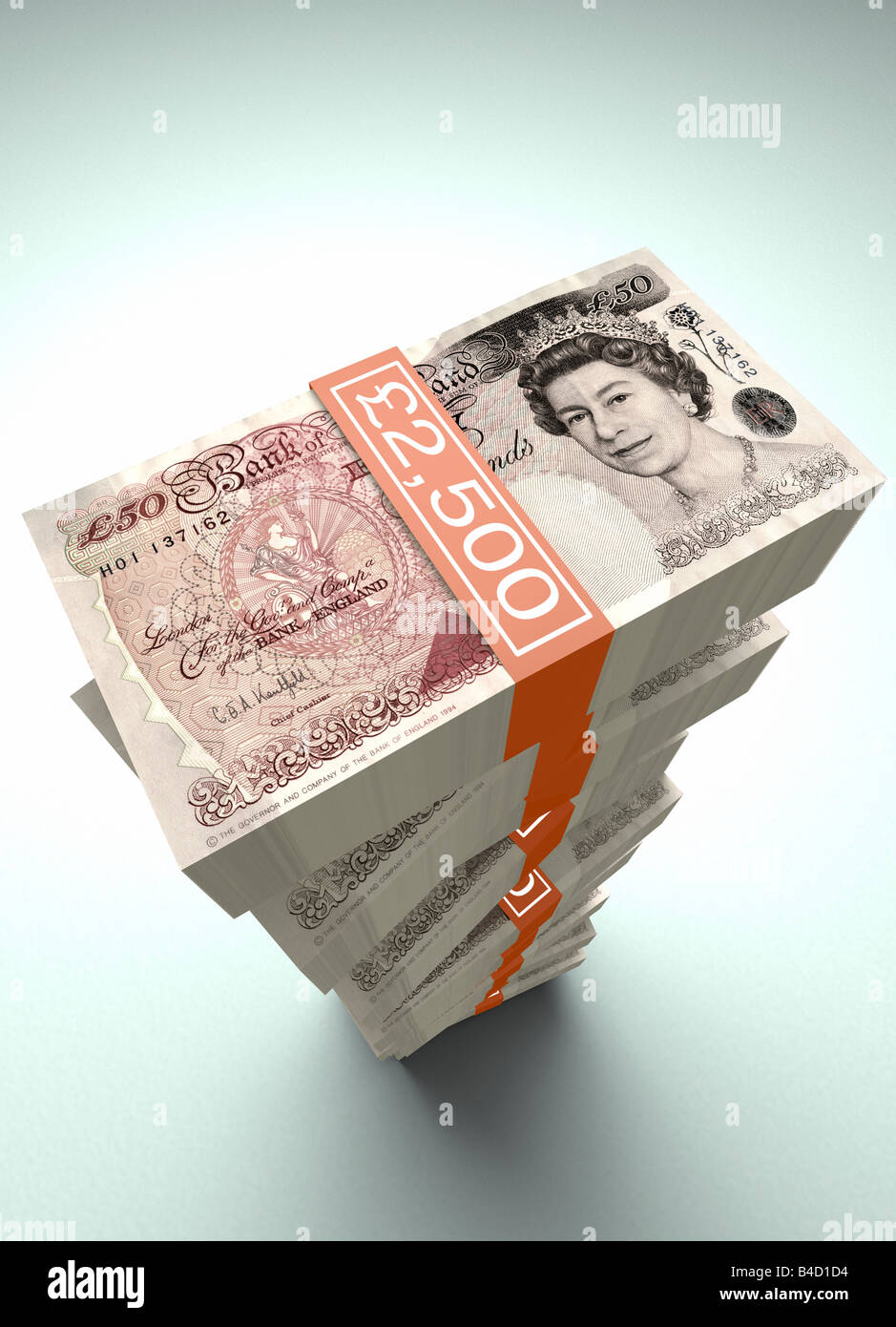 Large stack of £50 pound British bank notes on plain background with ...