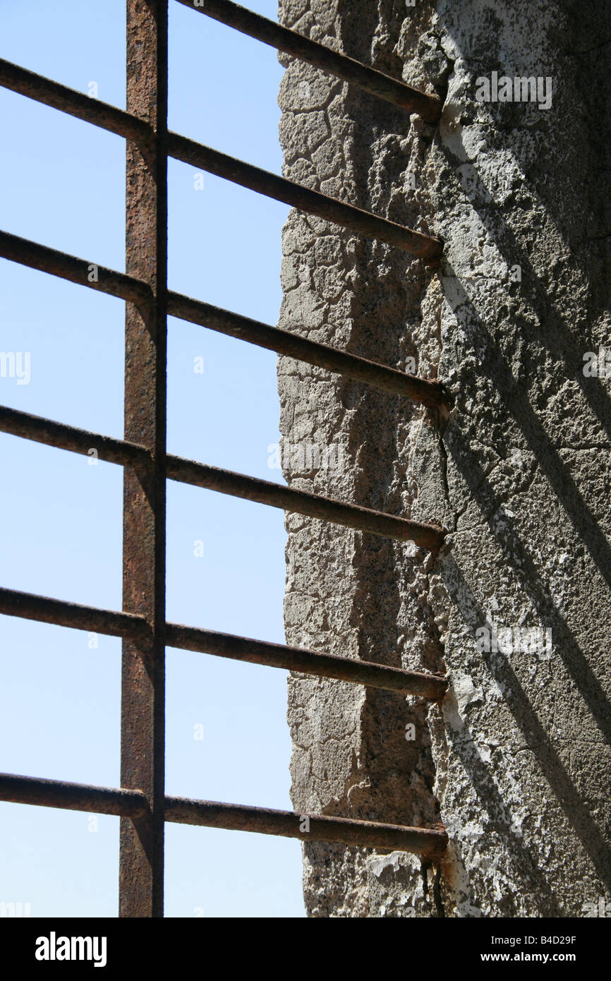 one high dark prison cell window with metal bars Stock Photo - Alamy