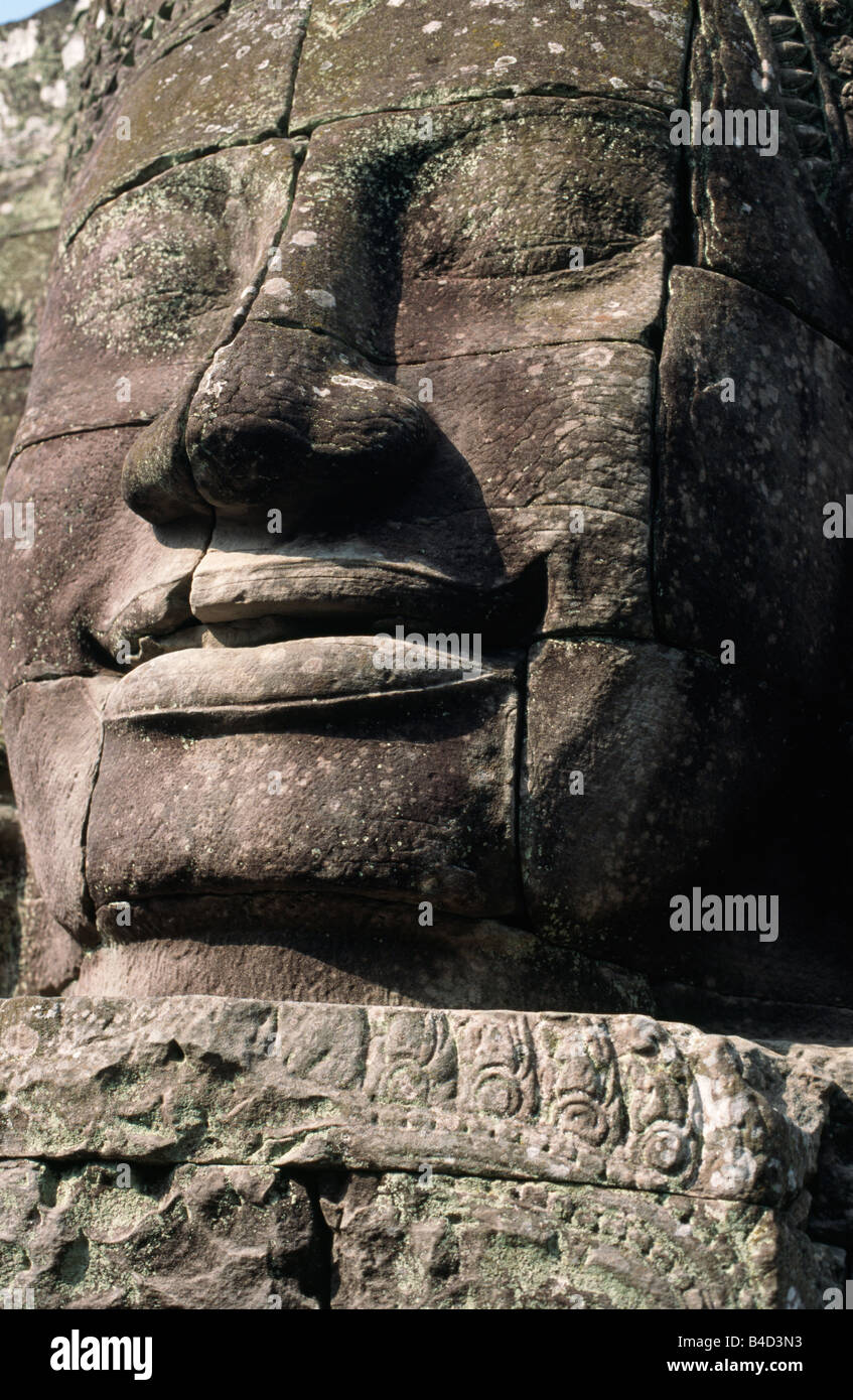 The smile of Angkor. Sculpted from stone, the smiling faces at Bayon ...