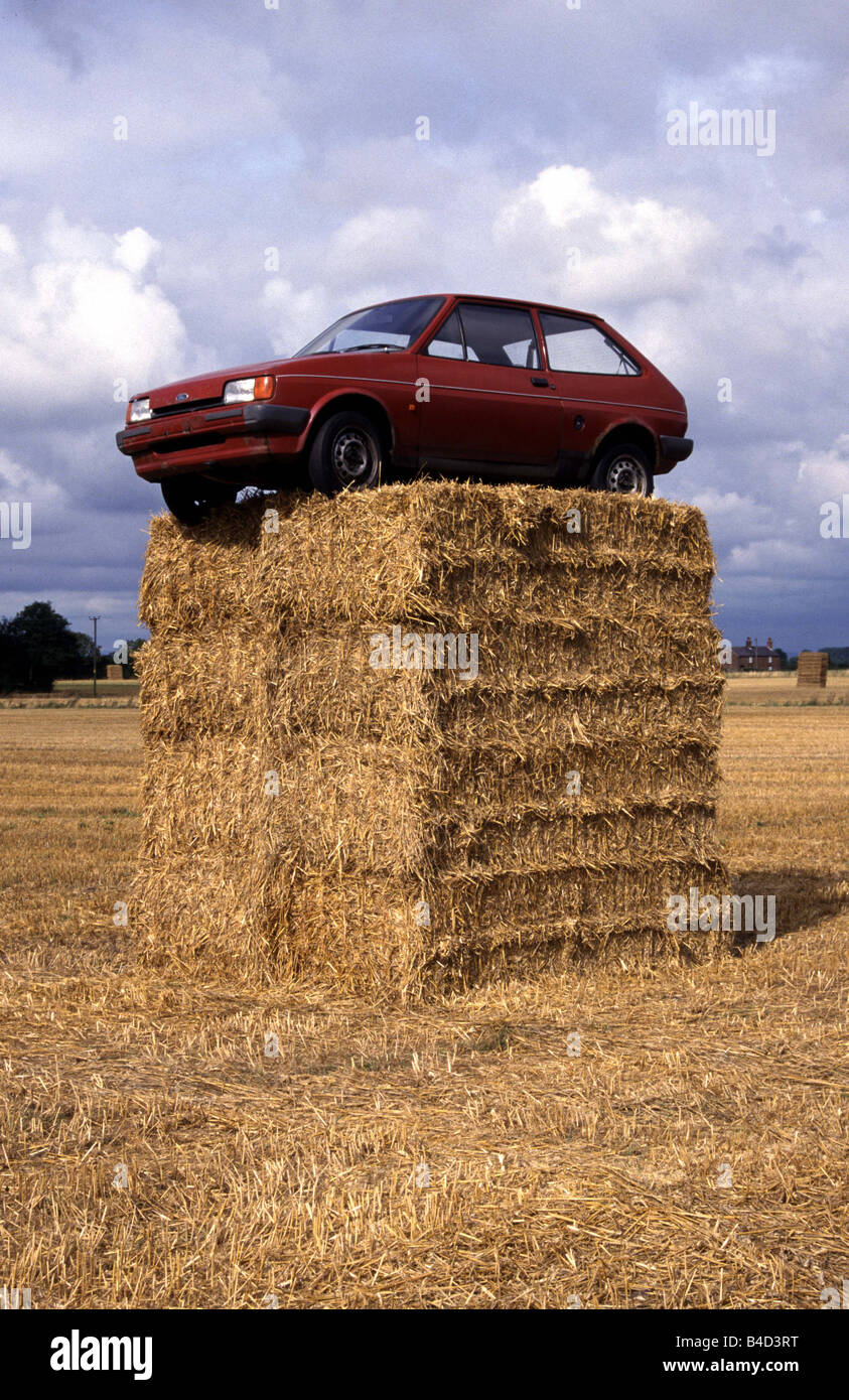 Car parked on top of straw bales Stock Photo - Alamy