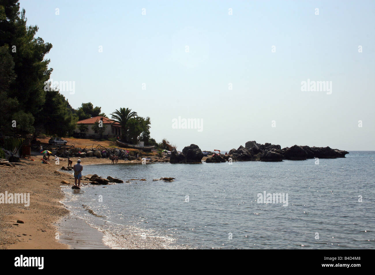THE TRANQUIL BEACH AT LOUTRA ON THE KASSANDRA PENINSULA. HALKIDIKI ...