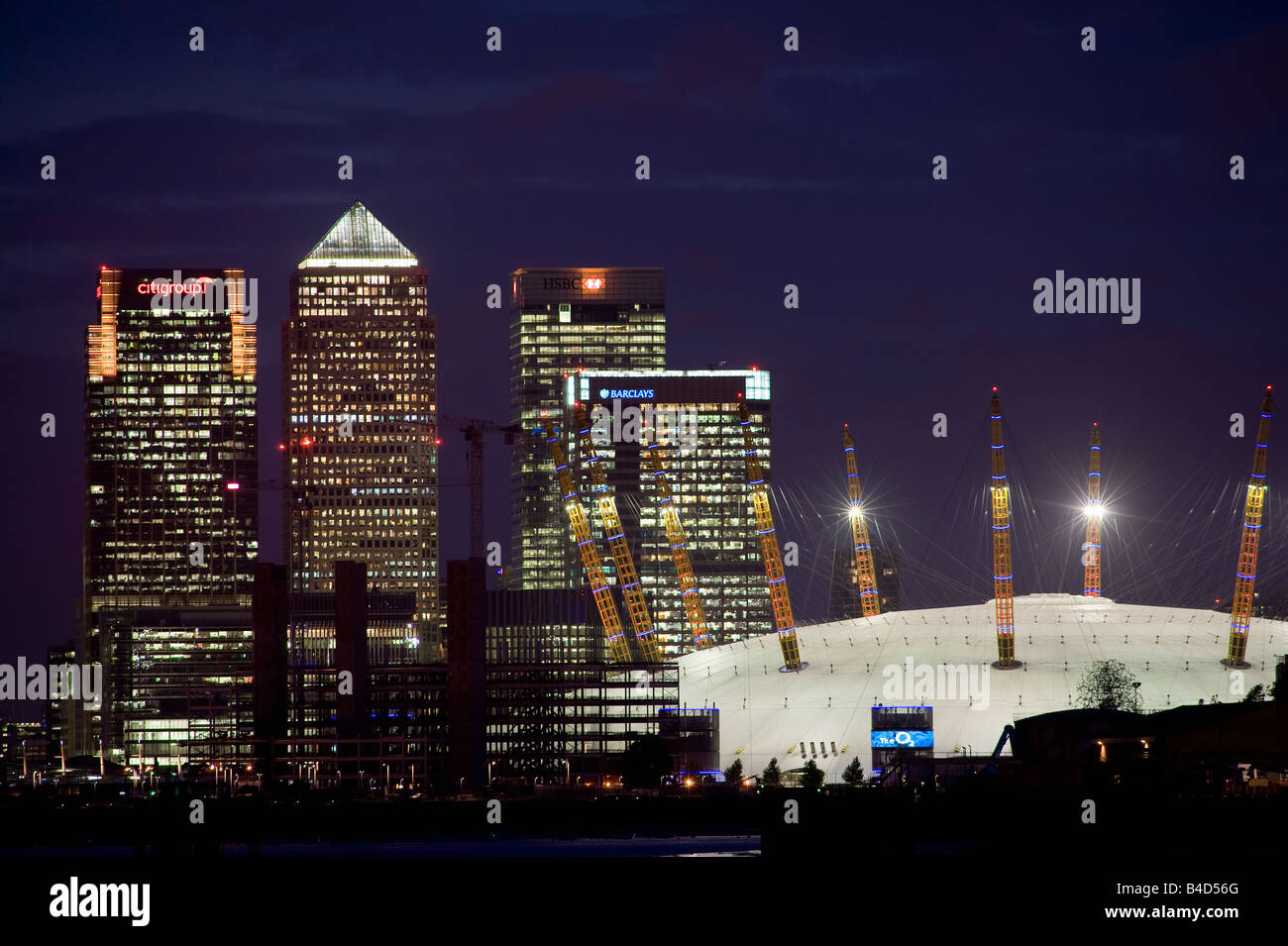 London England Canary Wharf and The Millenium Dome at night Stock Photo ...