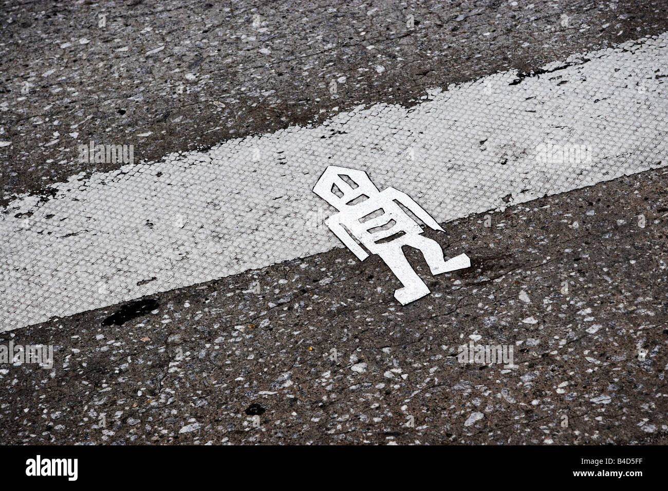 The symbol of a walking man indicates a pedestrian crosswalk in ...