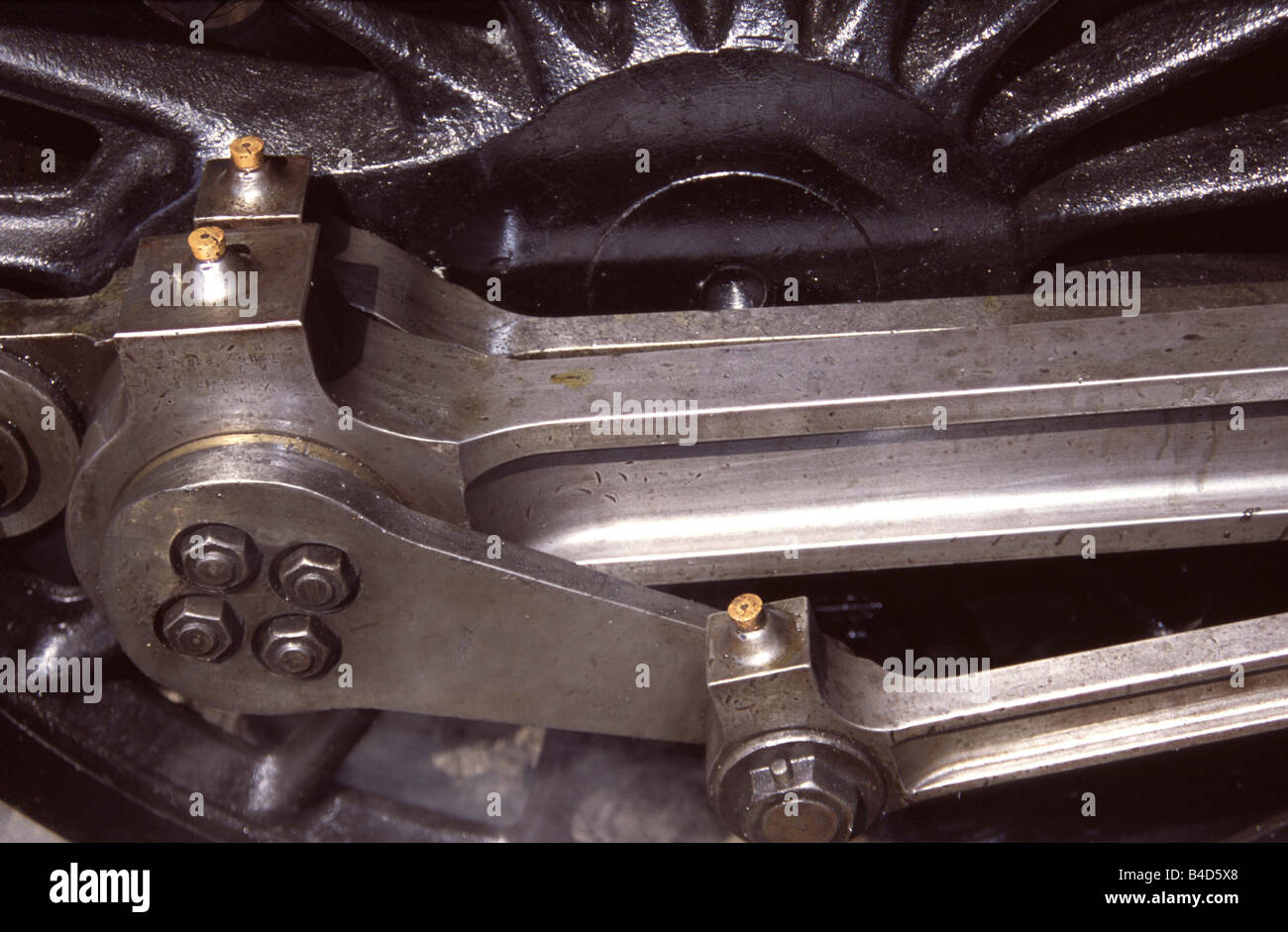 Wheel linkage components on a steam engine Stock Photo - Alamy