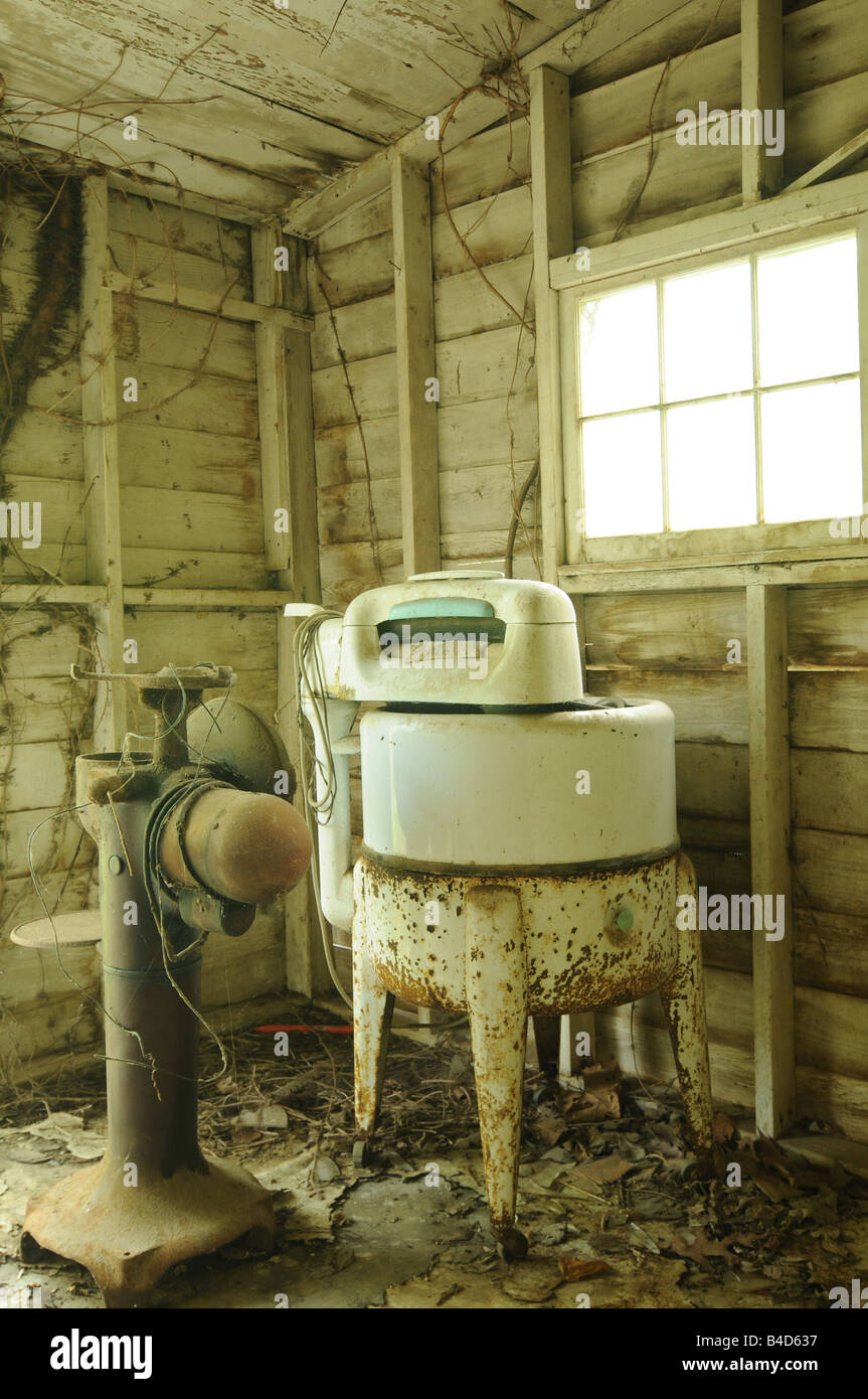 Old washing machine at abandoned farm house Stock Photo - Alamy